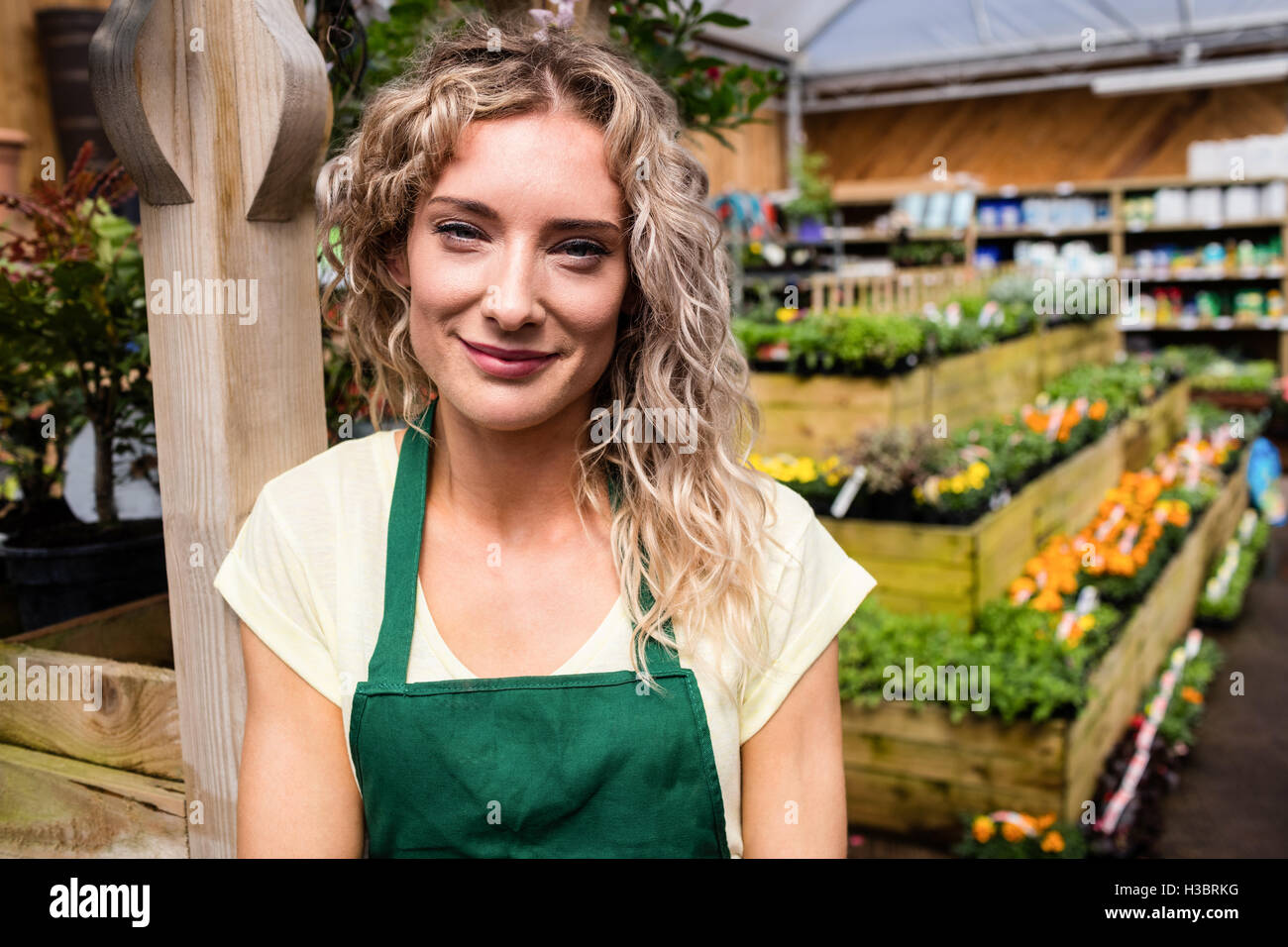 Smiling staff standing in hi-res stock photography and images - Alamy