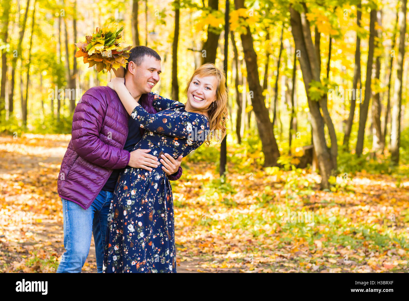 love, relationship, family and people concept - couple in autumn park ...