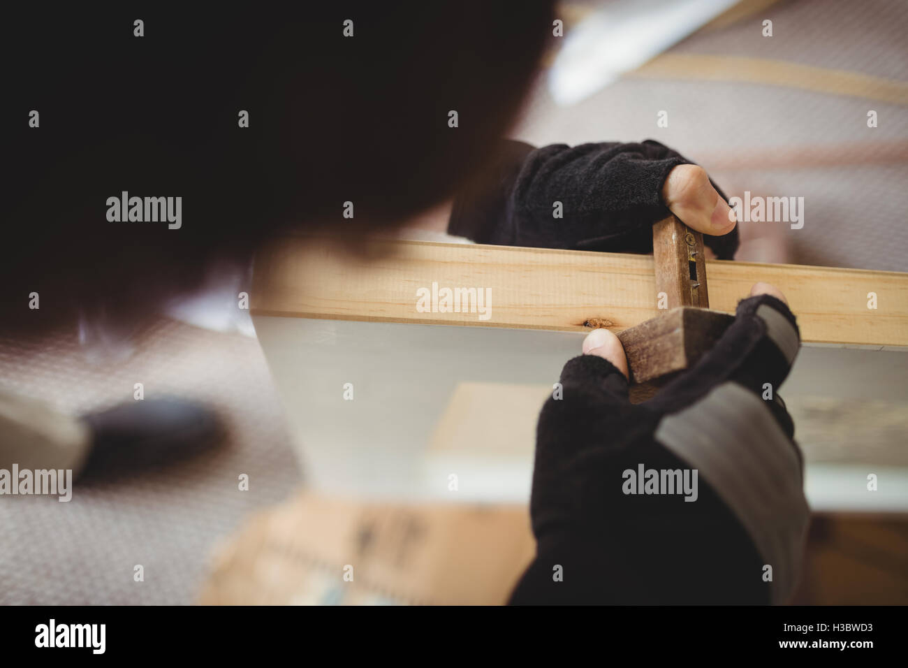 Carpenter using marking gauge on a wooden door Stock Photo - Alamy