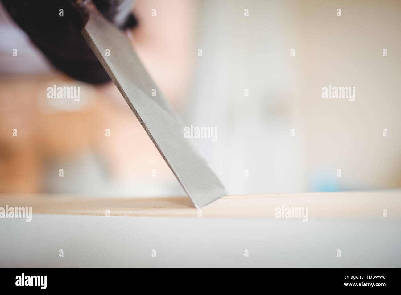 Chisel with wooden door Stock Photo - Alamy