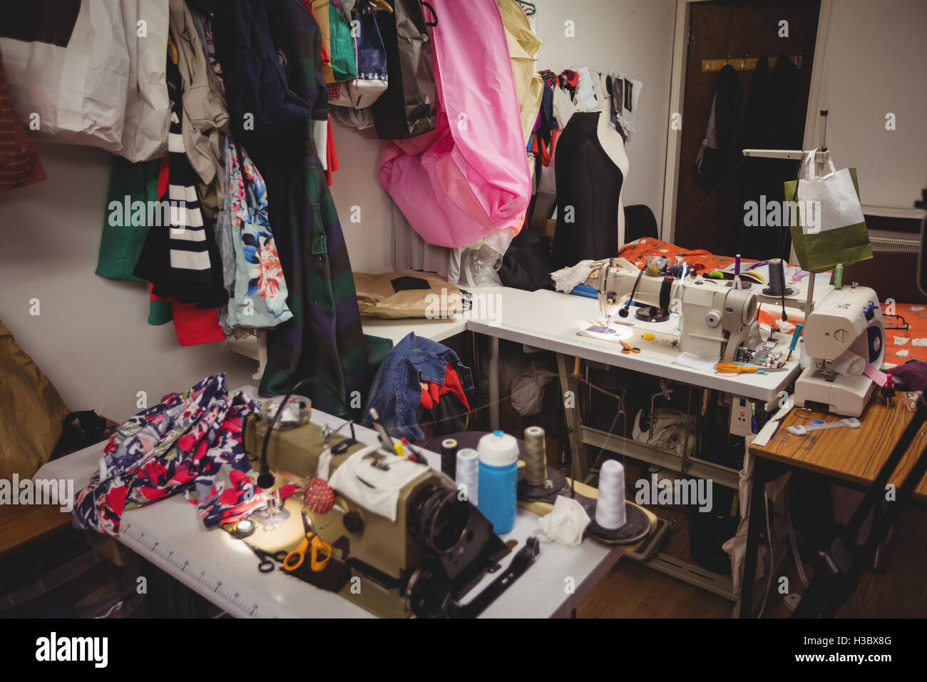Sewing area in the studio Stock Photo - Alamy