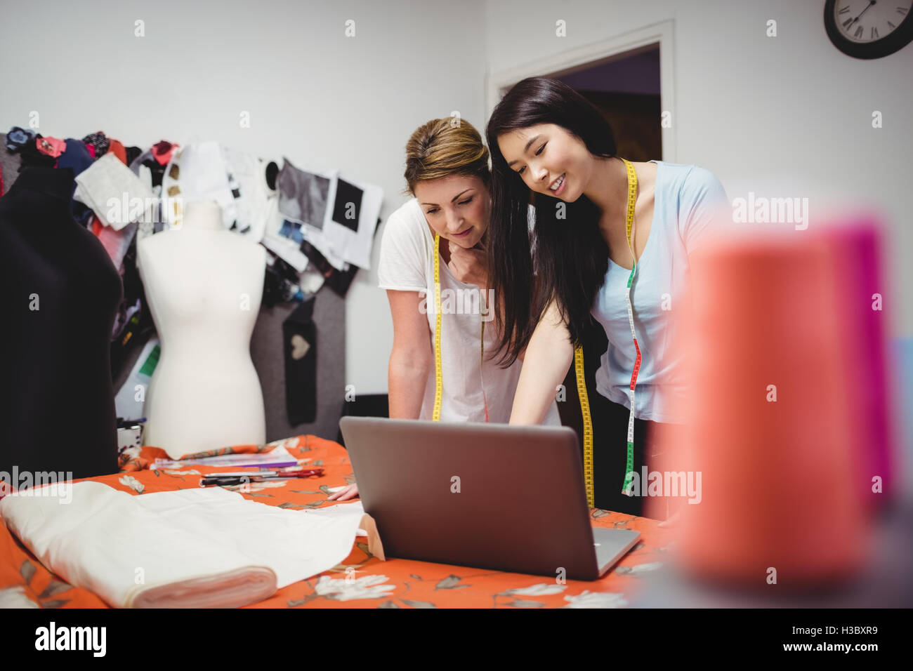 Female designer working on computer hi-res stock photography and images ...