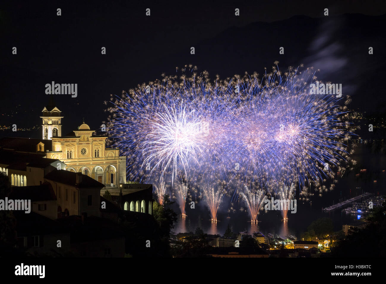 Summer fireworks in front of Locarno church of Madonna del Sasso ...