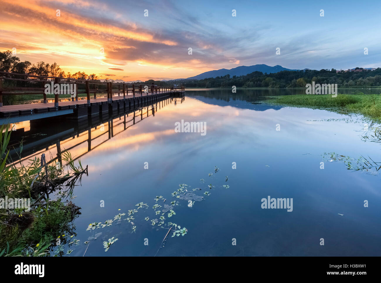 View from the surface of Lago di Varese during a sunset, Varese ...