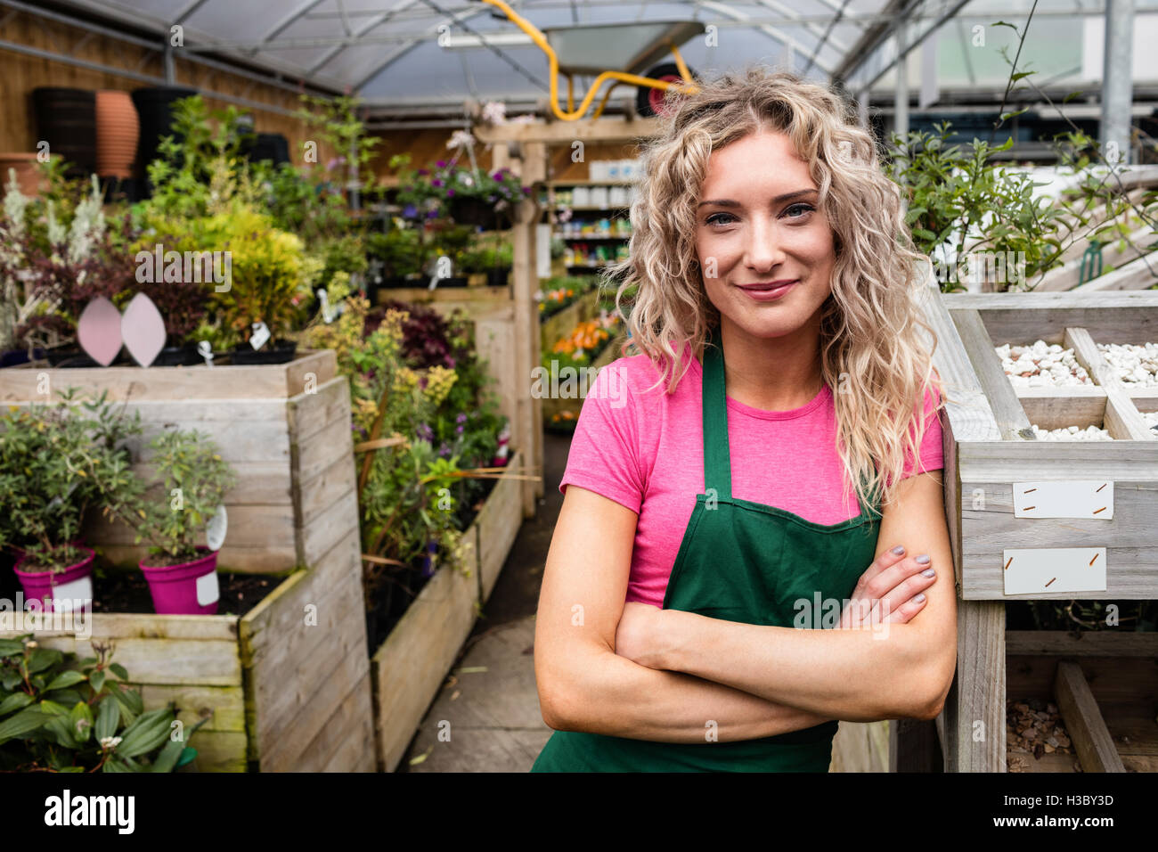 Portrait of female florist standing with arms crossed Stock Photo - Alamy