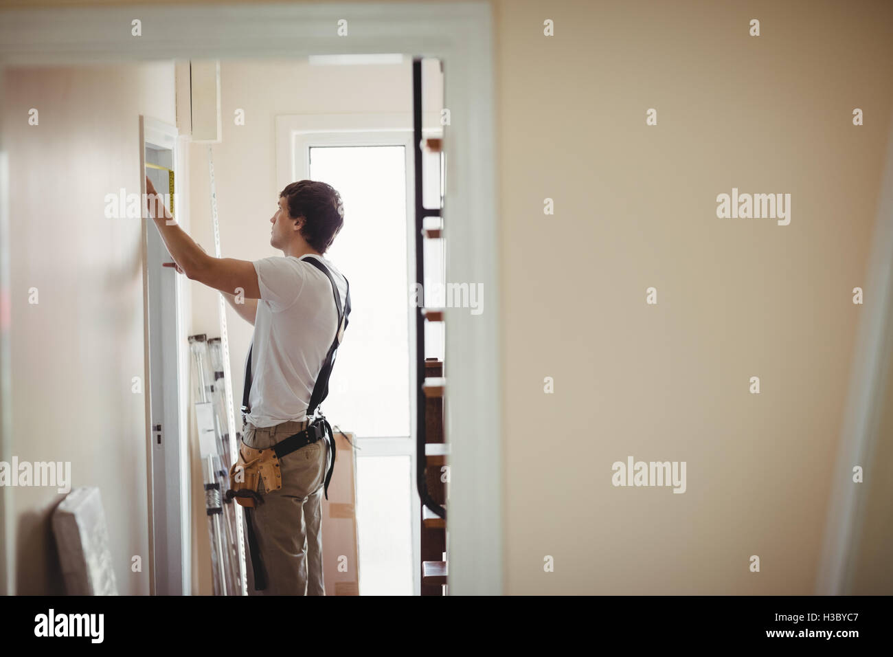 Repairman working house door hi-res stock photography and images - Alamy