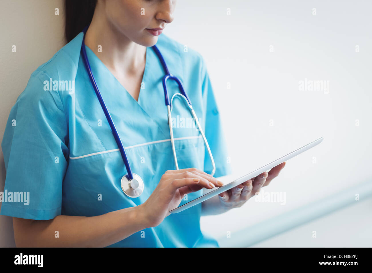 Nurse using digital tablet Stock Photo - Alamy