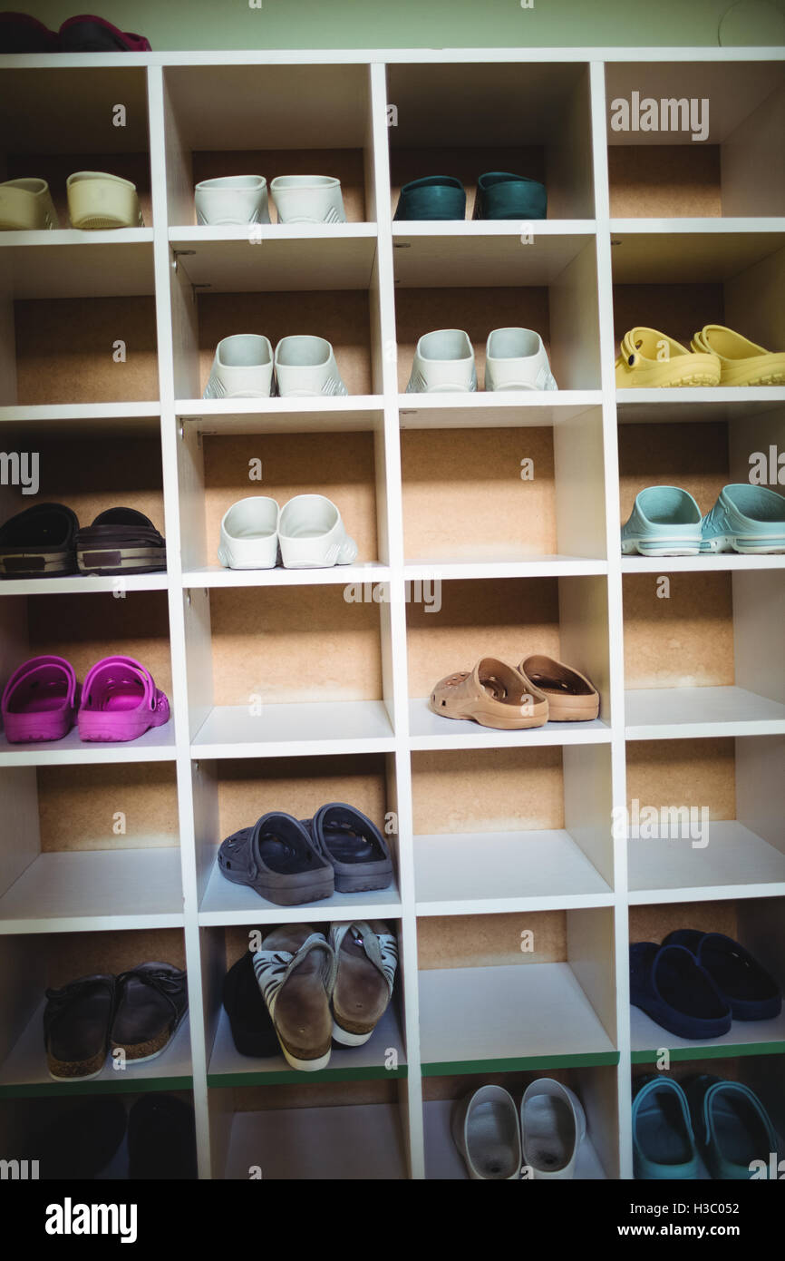Shoes arranged in rack Stock Photo - Alamy