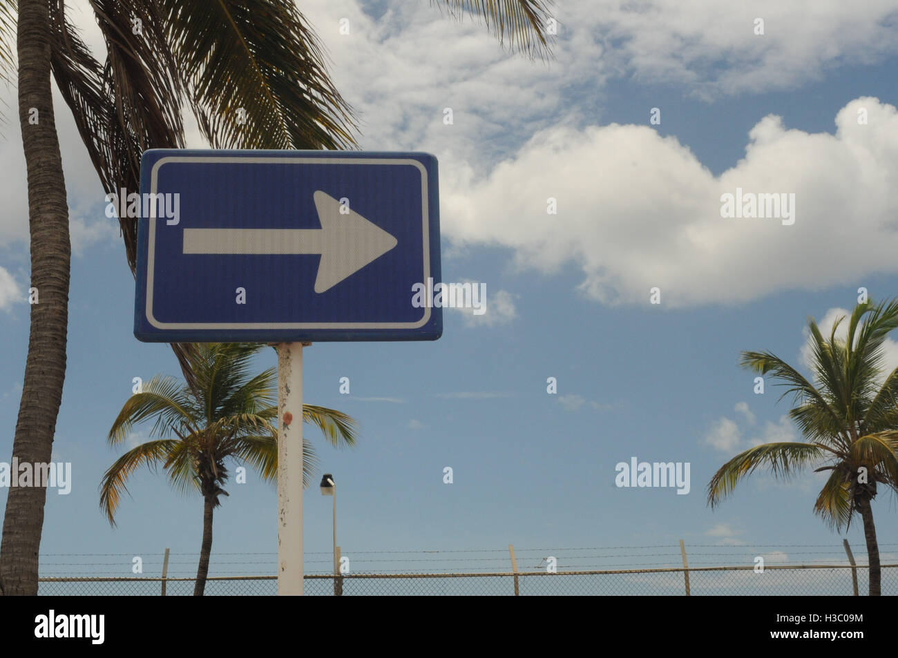 This image shows an arrows directing to the right direction , in a blue ...