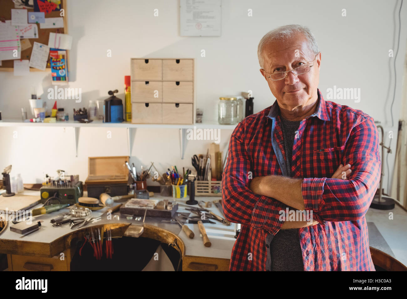 Portrait of goldsmith in workshop Stock Photo - Alamy