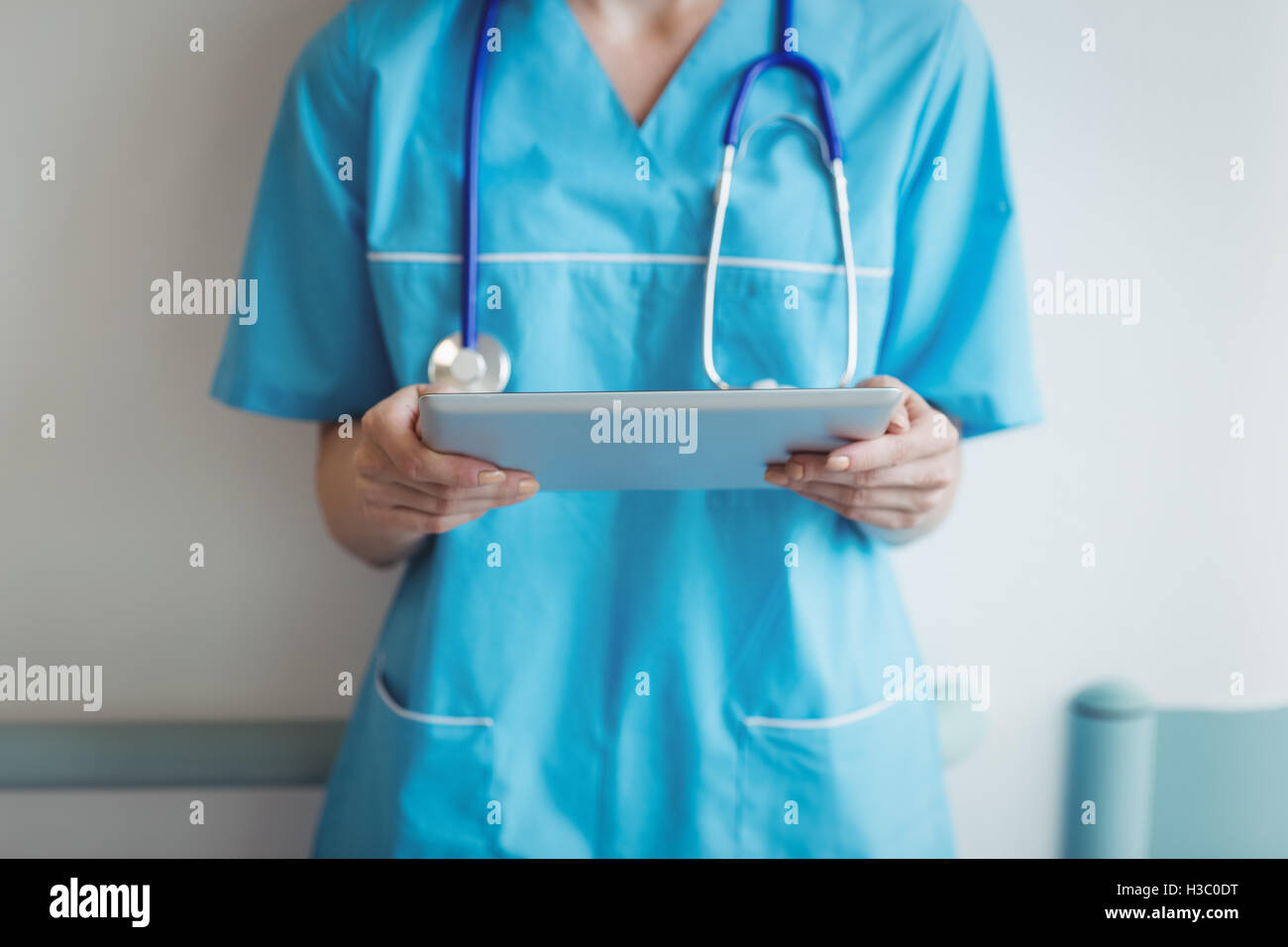 Nurse using digital tablet Stock Photo - Alamy