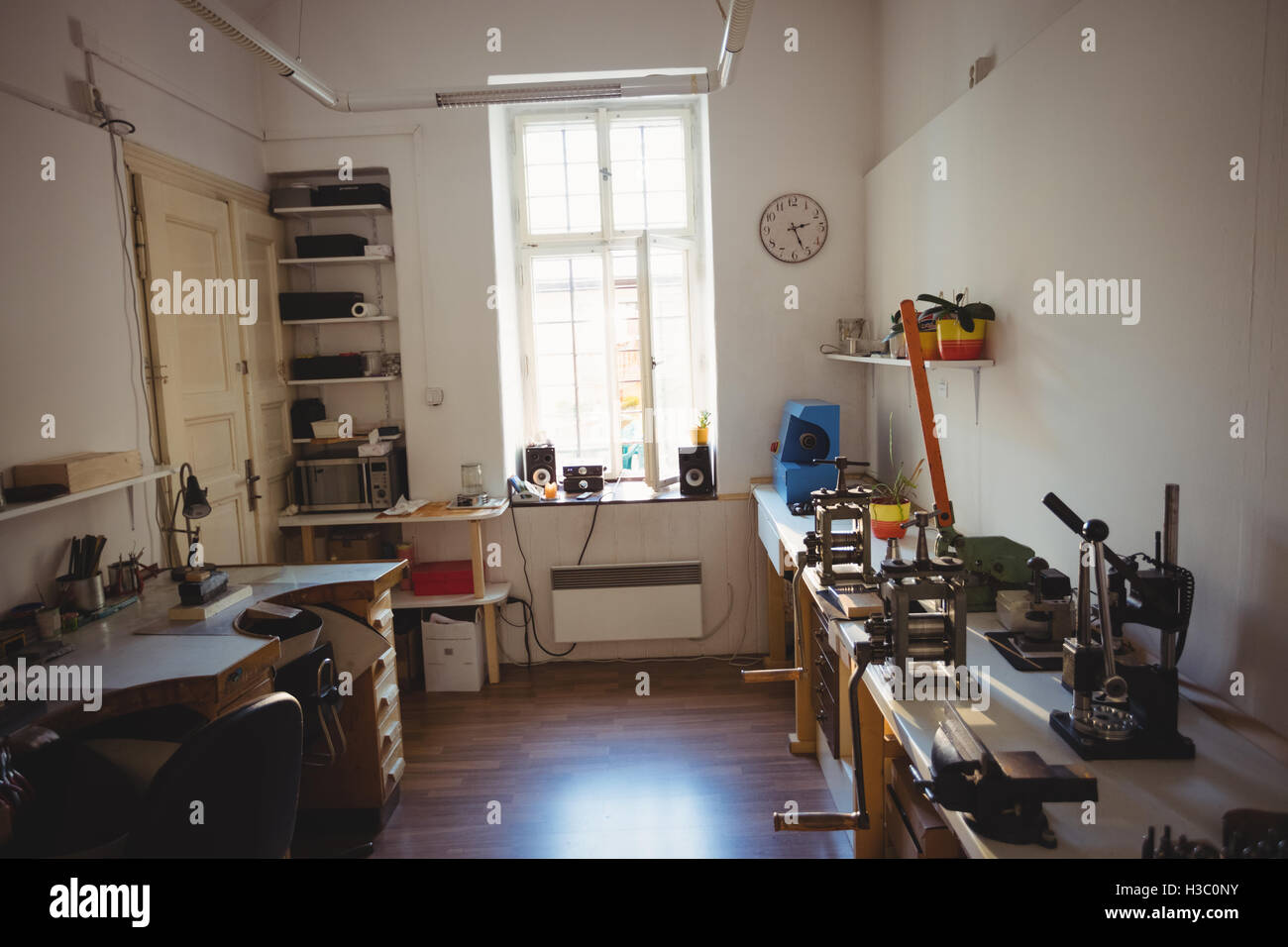 Goldsmith work tools on workbench Stock Photo - Alamy