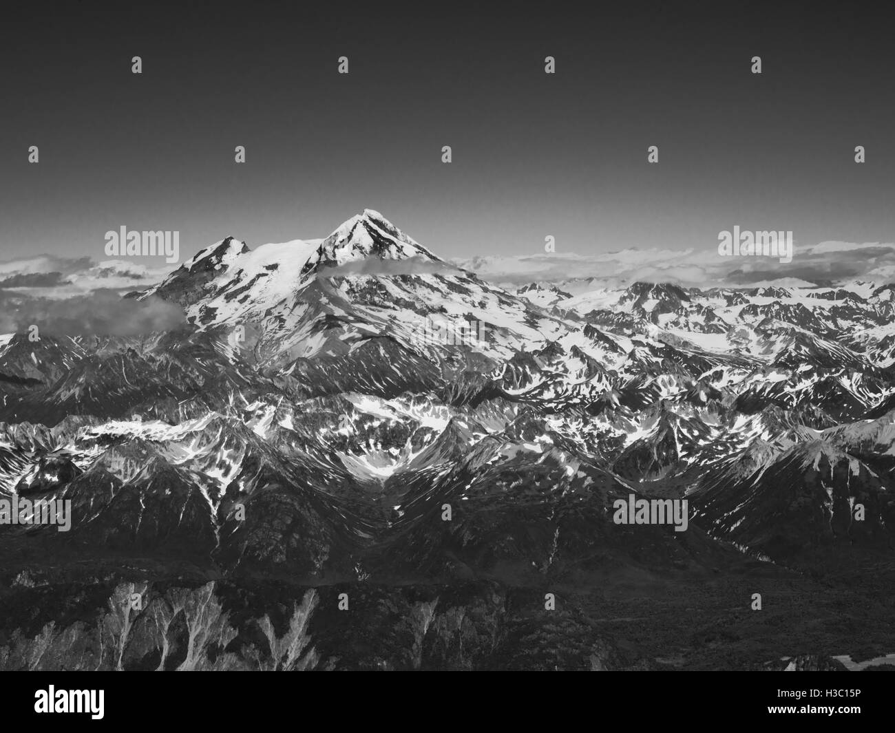 Aerial view of the Redoubt Volcano, shrouded in the clouds, with ...
