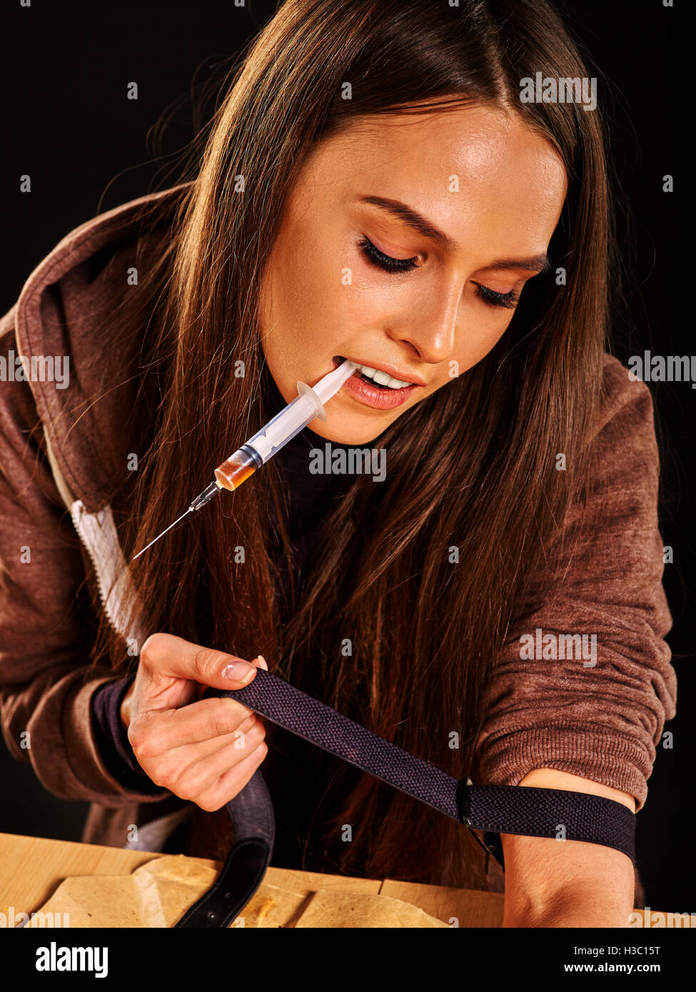 Female drug addict with syringe hi-res stock photography and images - Alamy