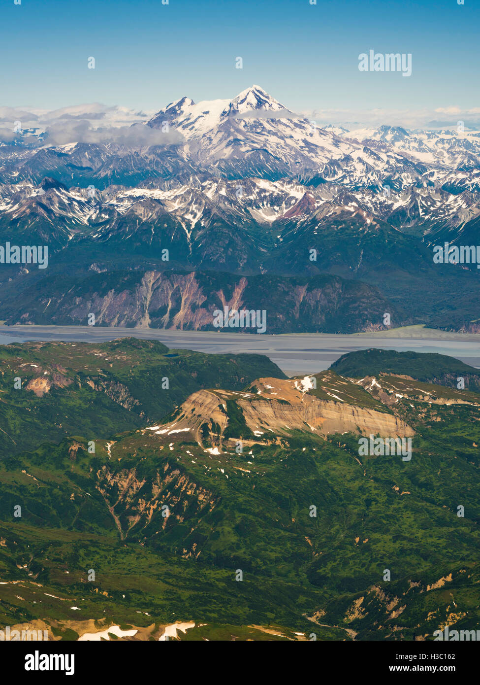 Aerial view of the Redoubt Volcano, shrouded in the clouds, with ...