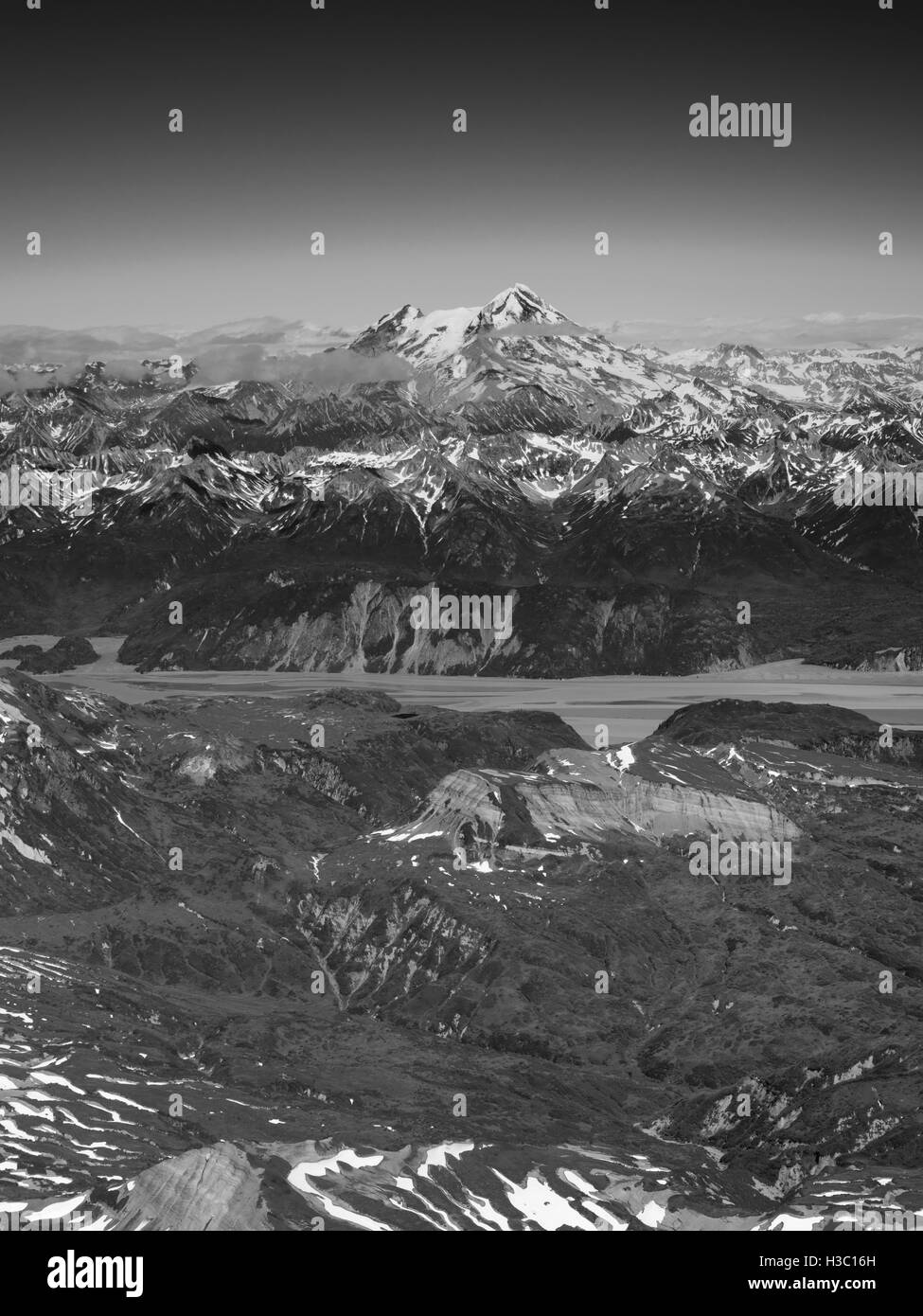 Aerial view of the Redoubt Volcano, shrouded in the clouds, with ...
