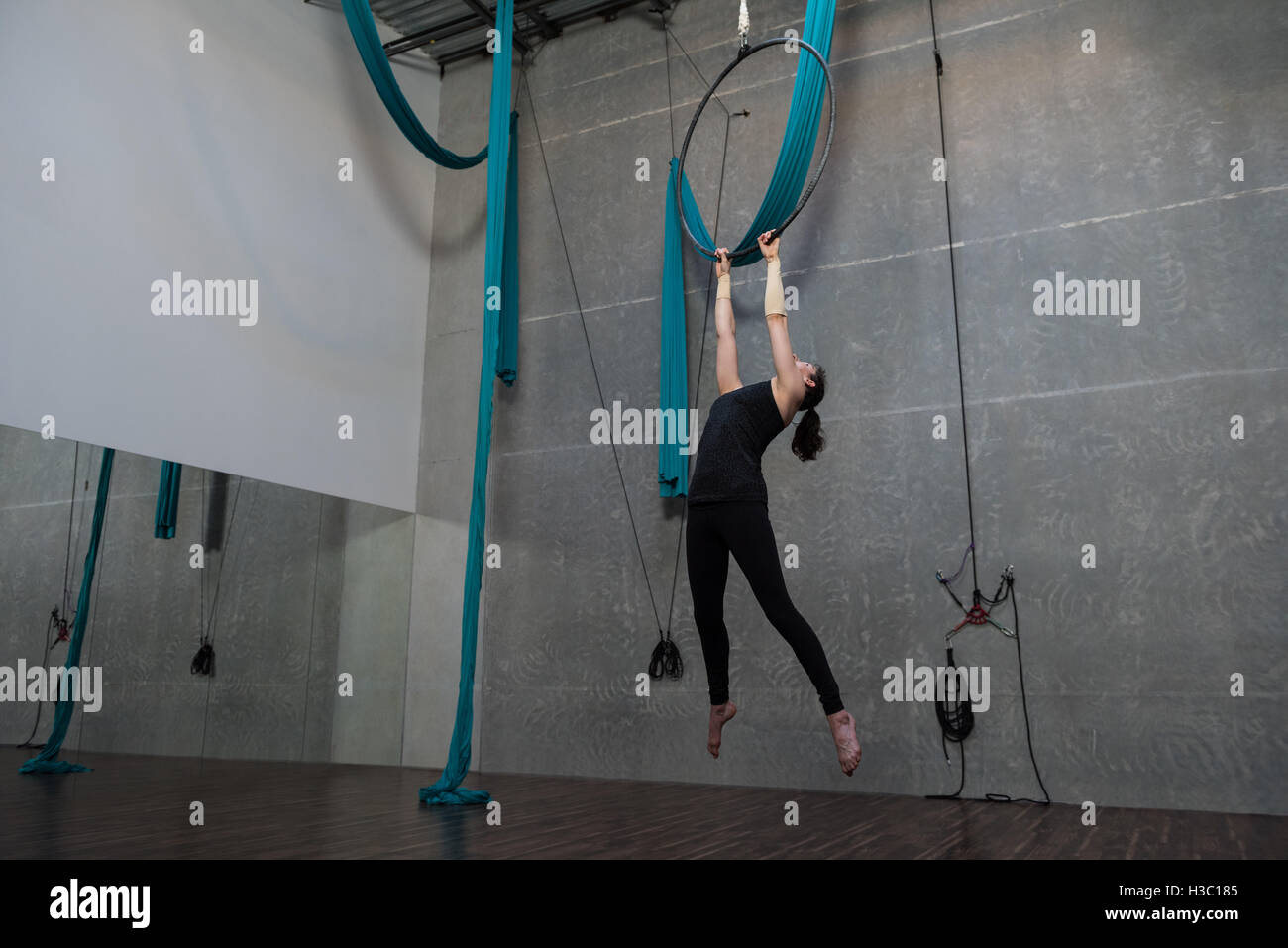 Gymnast performing gymnastics on hoop Stock Photo - Alamy