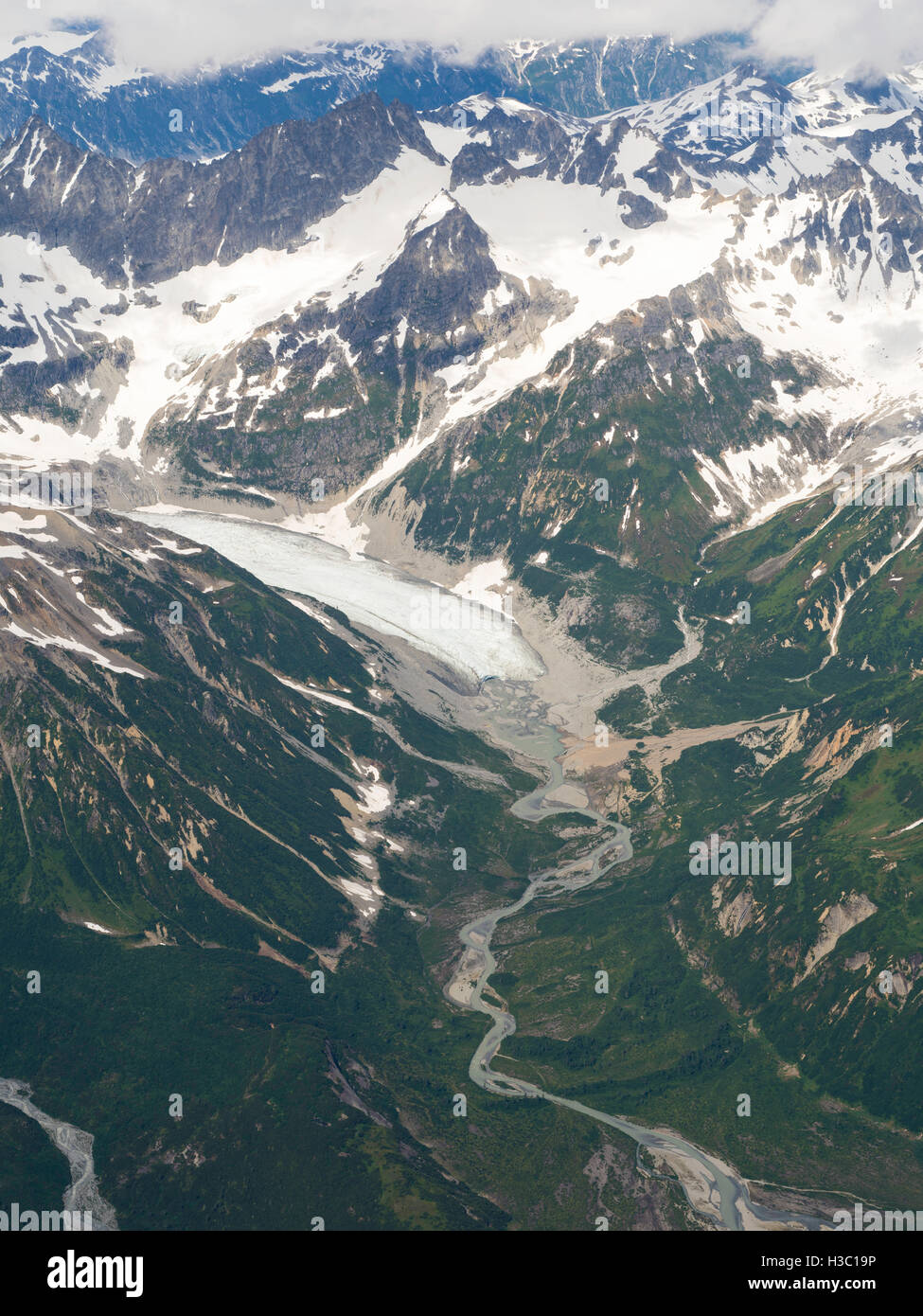 Aerial view of mountains, snow and glaciers, Lake Clark National Park ...