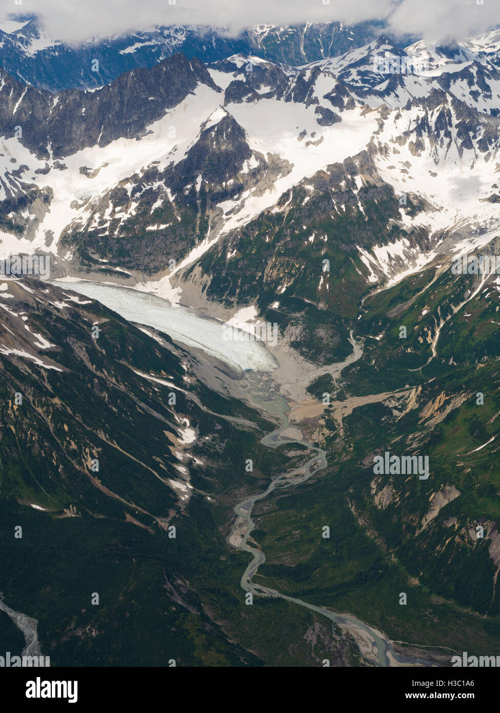 Aerial view of mountains, snow and glaciers, Lake Clark National Park ...