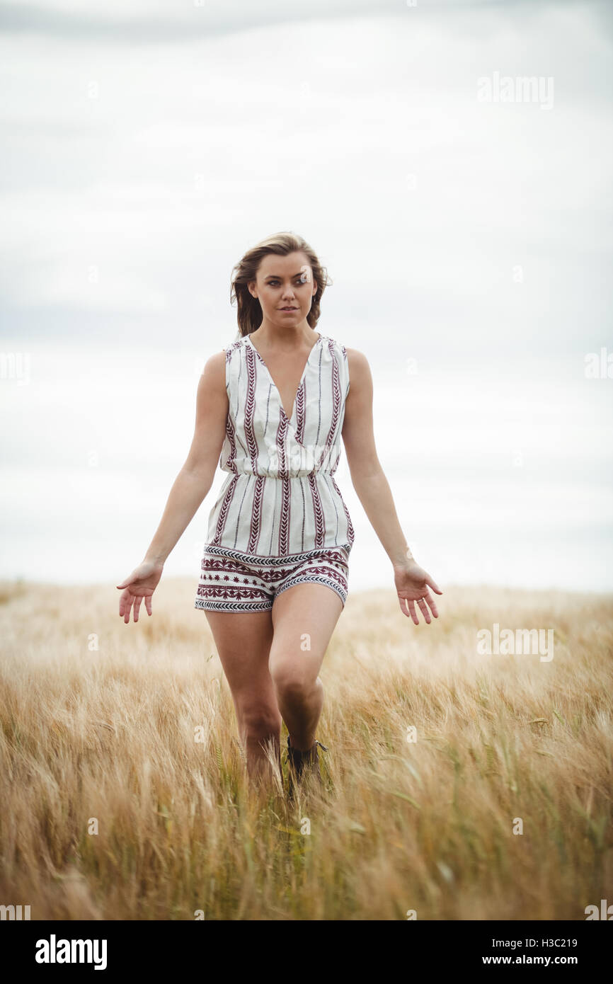 Pretty woman walking through field hi-res stock photography and images ...