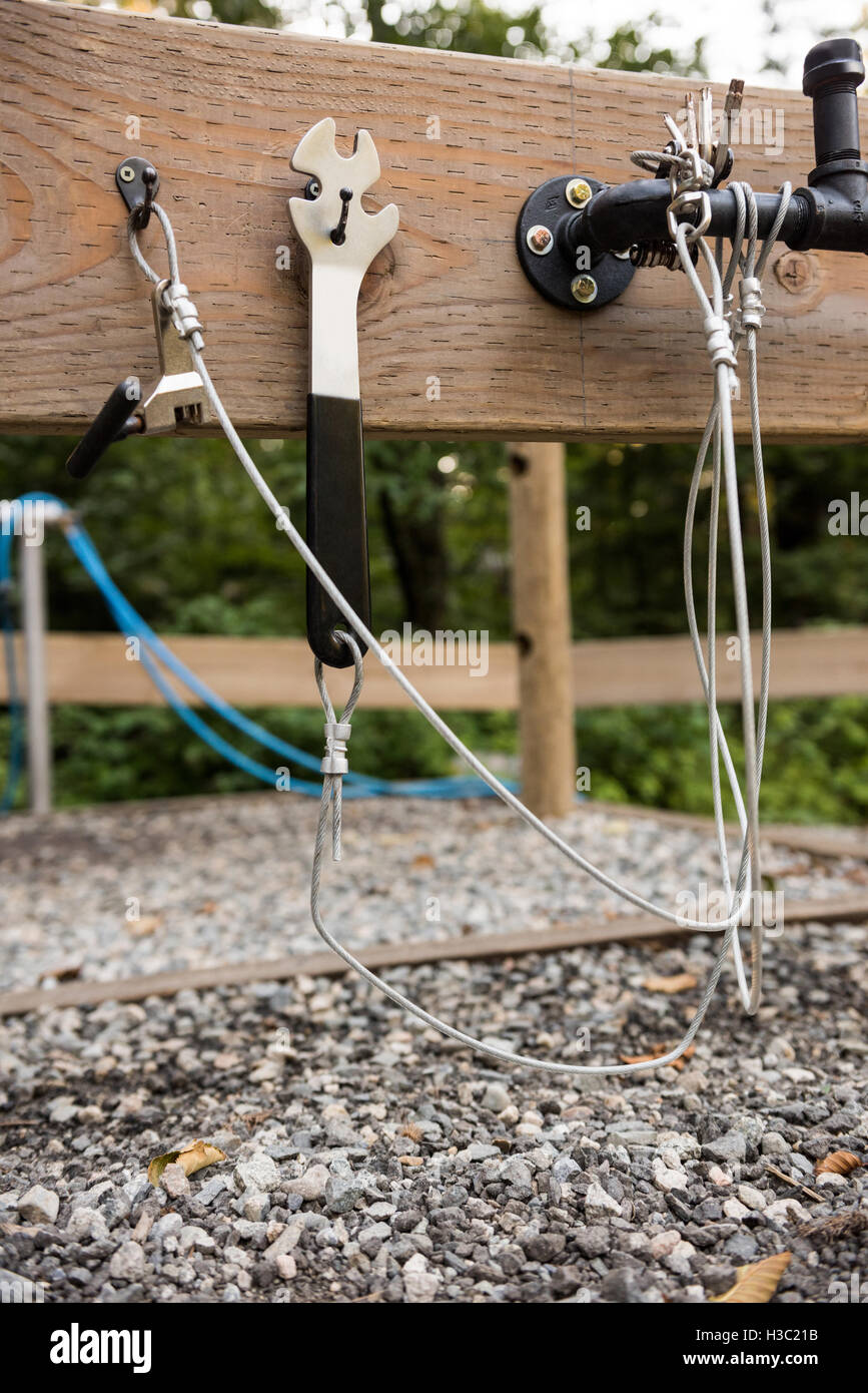 Work tool hanging on wooden plank Stock Photo - Alamy