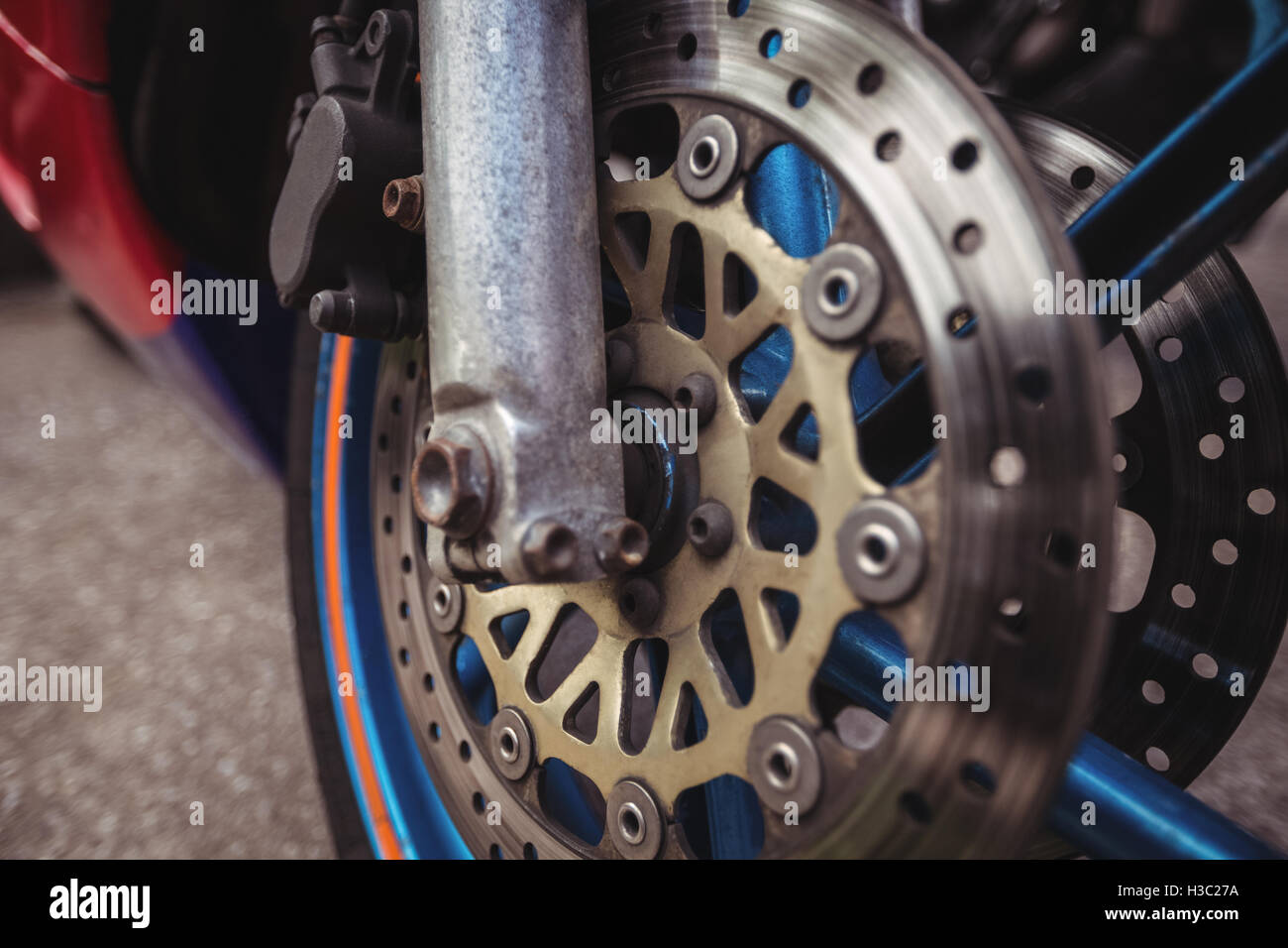 Close-up of motorcycle disc brake Stock Photo - Alamy