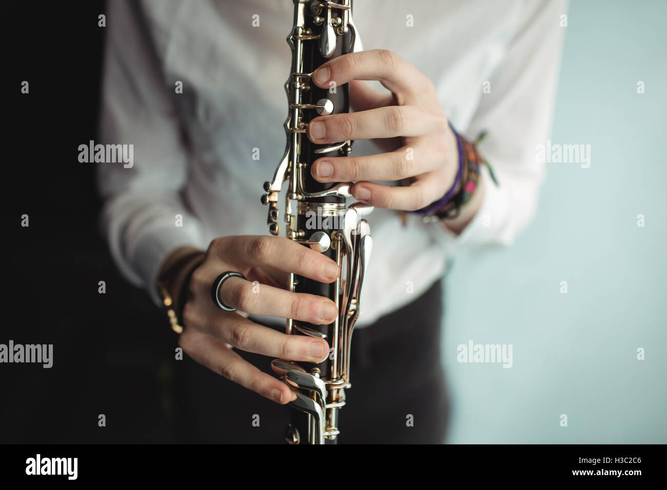 Woman playing a clarinet in music school Stock Photo - Alamy