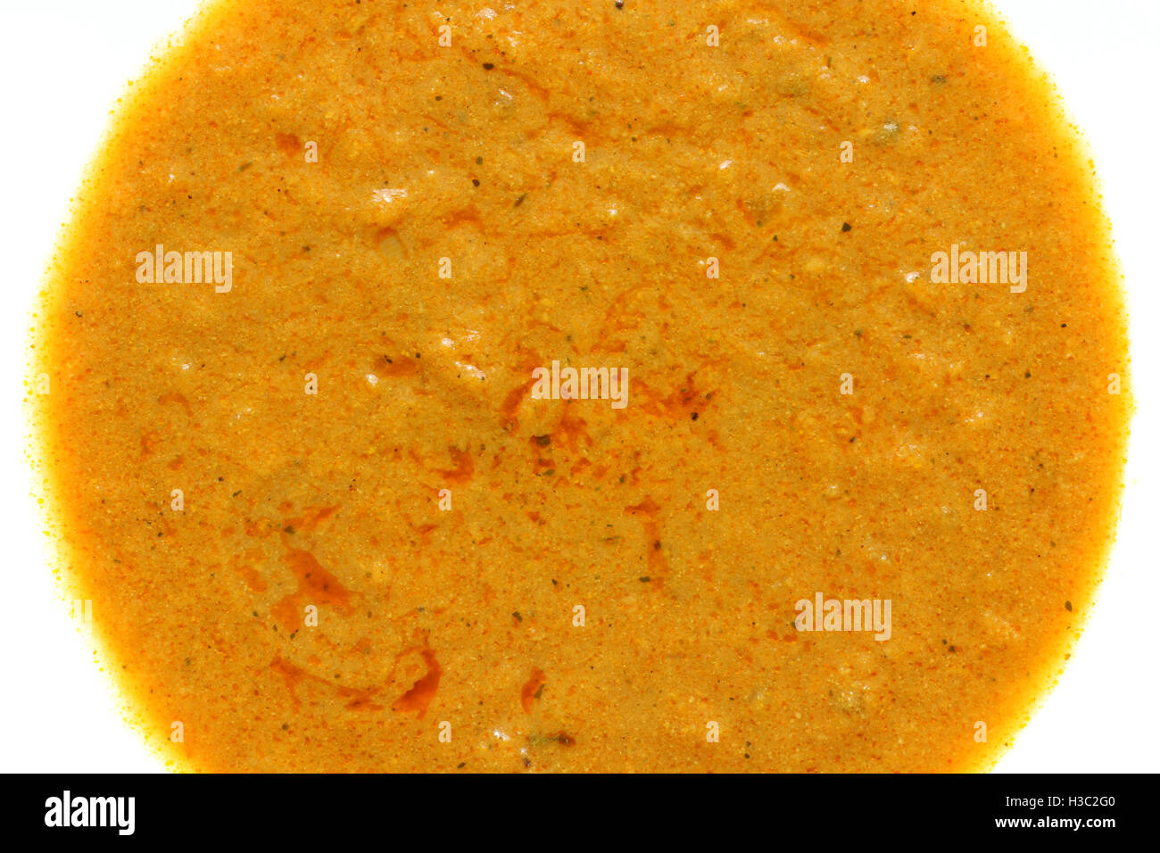 yellow curry sauce texture background Stock Photo - Alamy