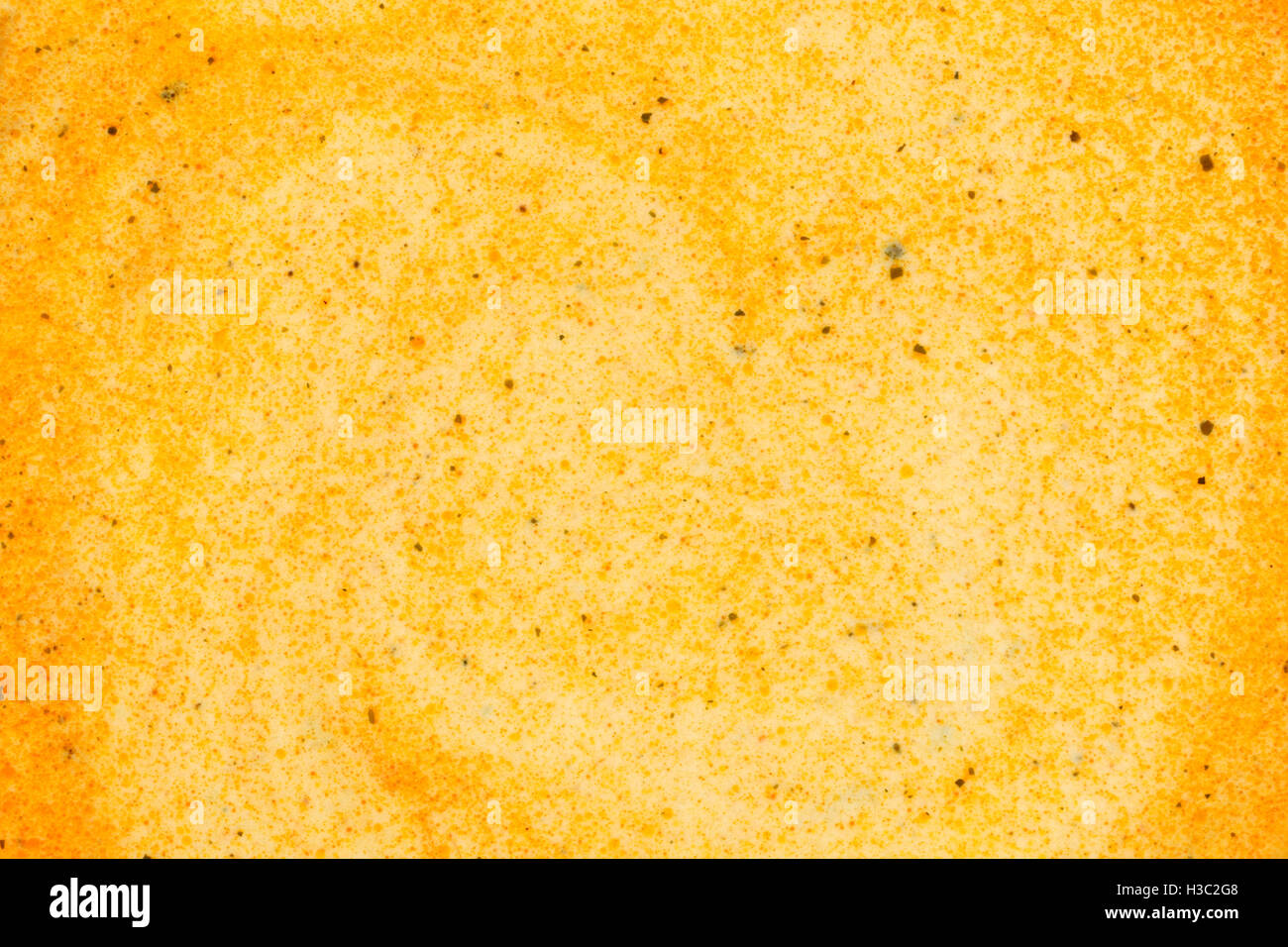 yellow curry sauce texture background #3 Stock Photo - Alamy
