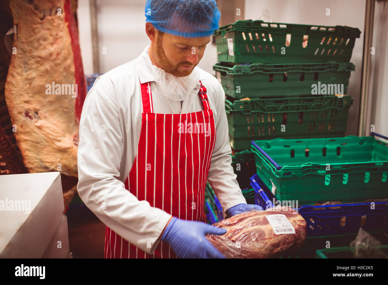 Close up butcher packing hi-res stock photography and images - Alamy