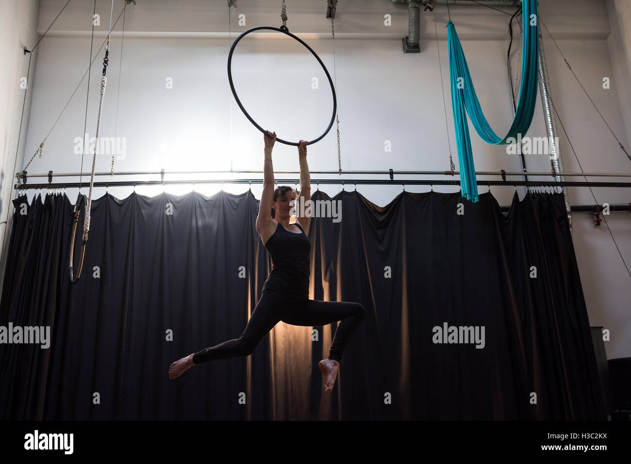 Gymnast performing gymnastics on hoop Stock Photo - Alamy