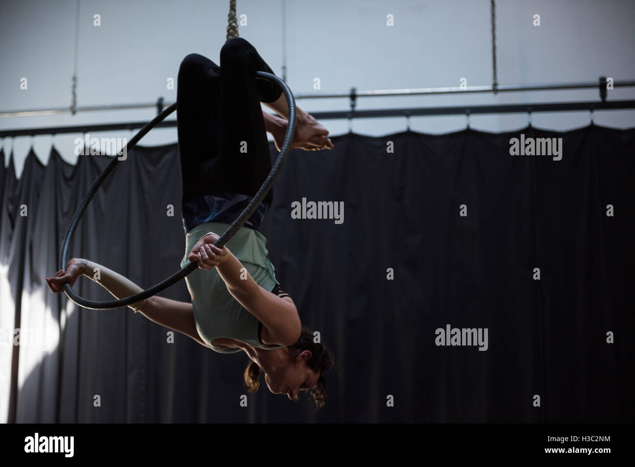 Gymnast performing gymnastics on hoop Stock Photo - Alamy