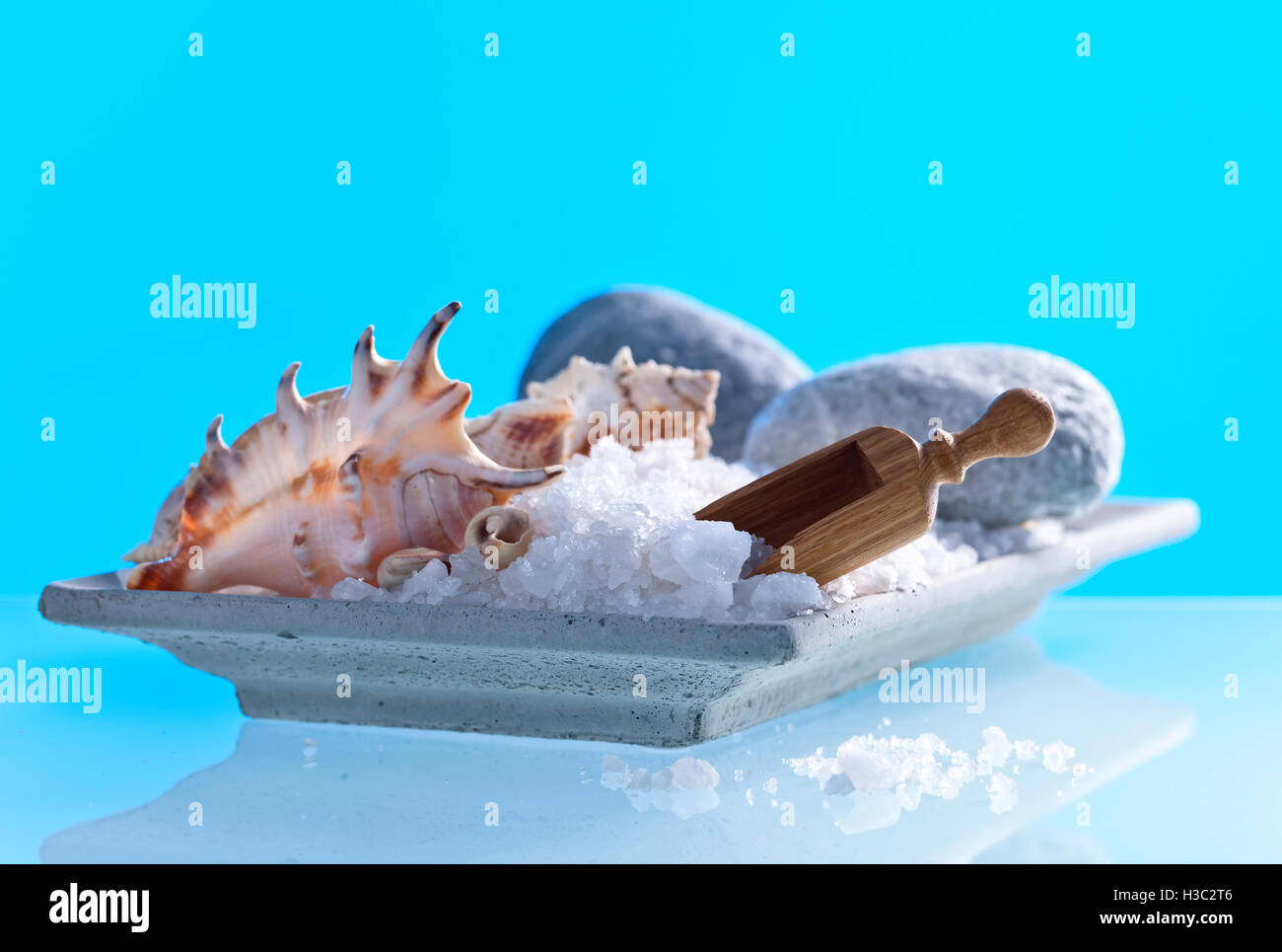 Sea salt on a glass table with stones and shells Stock Photo - Alamy