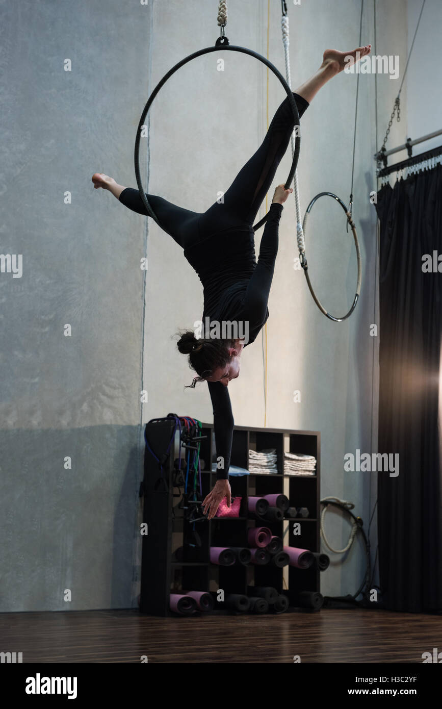 Gymnast performing gymnastics on hoop Stock Photo - Alamy