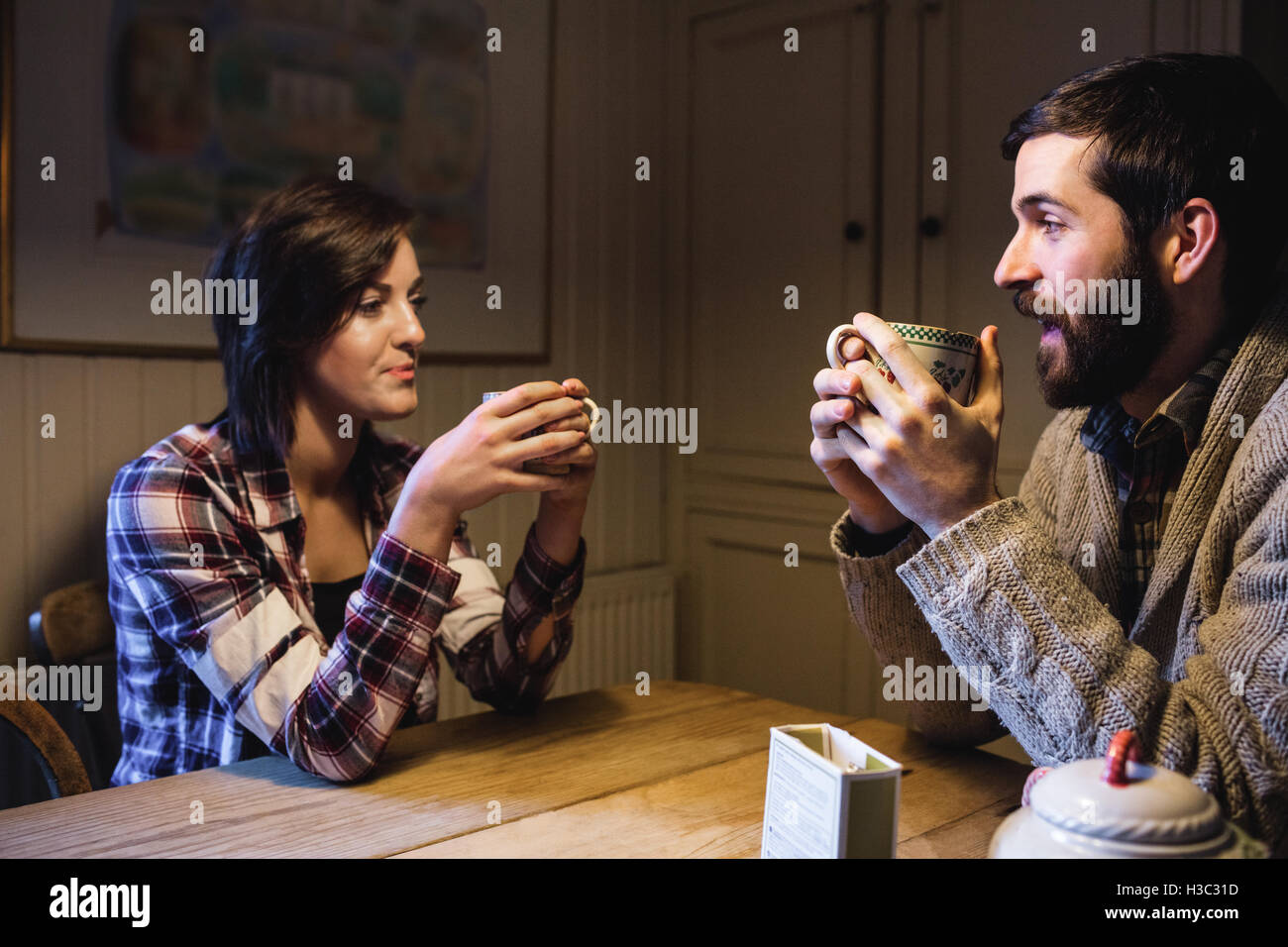 Couple having coffee together Stock Photo - Alamy