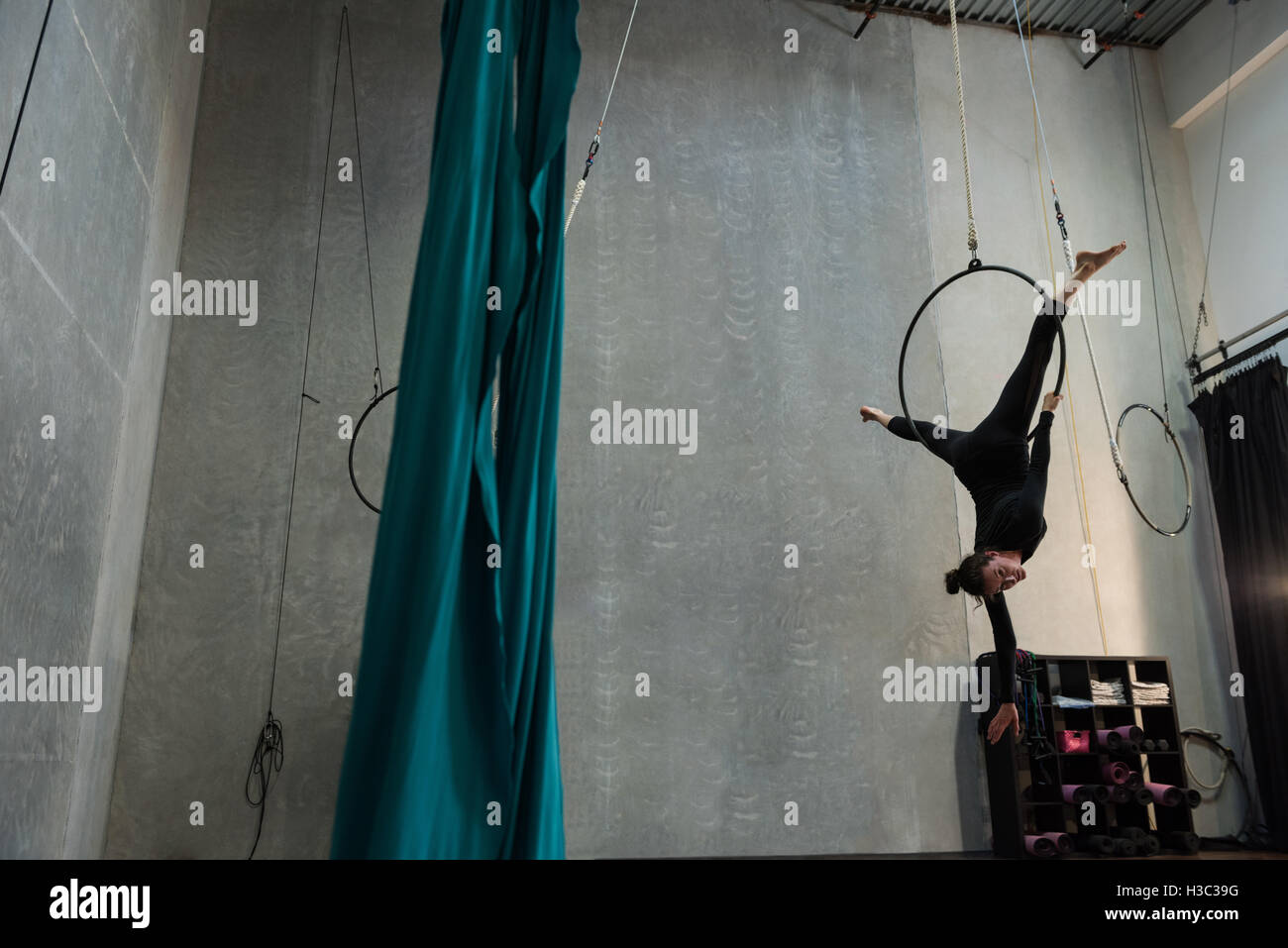 Gymnast performing gymnastics on hoop Stock Photo - Alamy