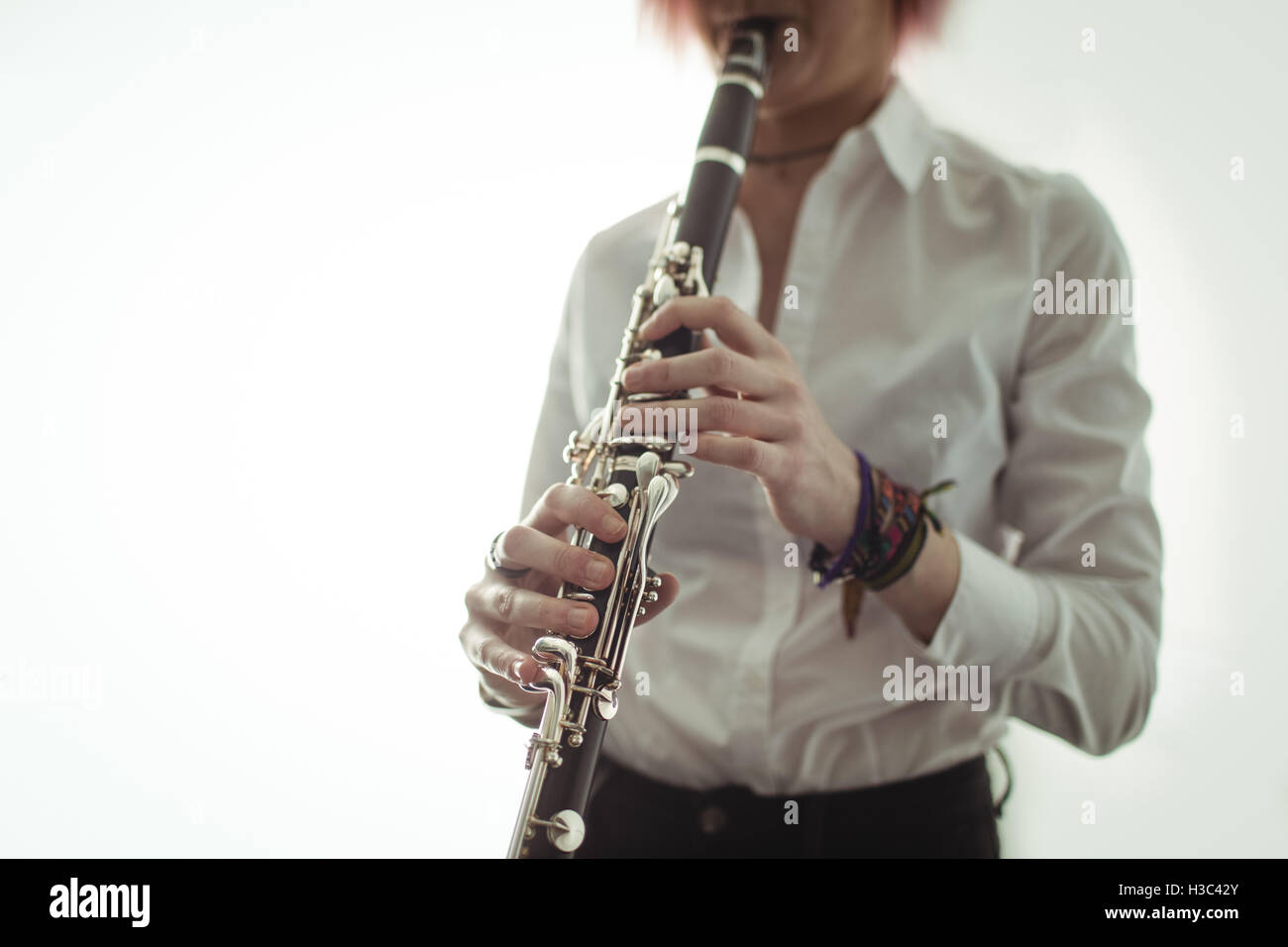 Woman playing a clarinet in music school Stock Photo - Alamy