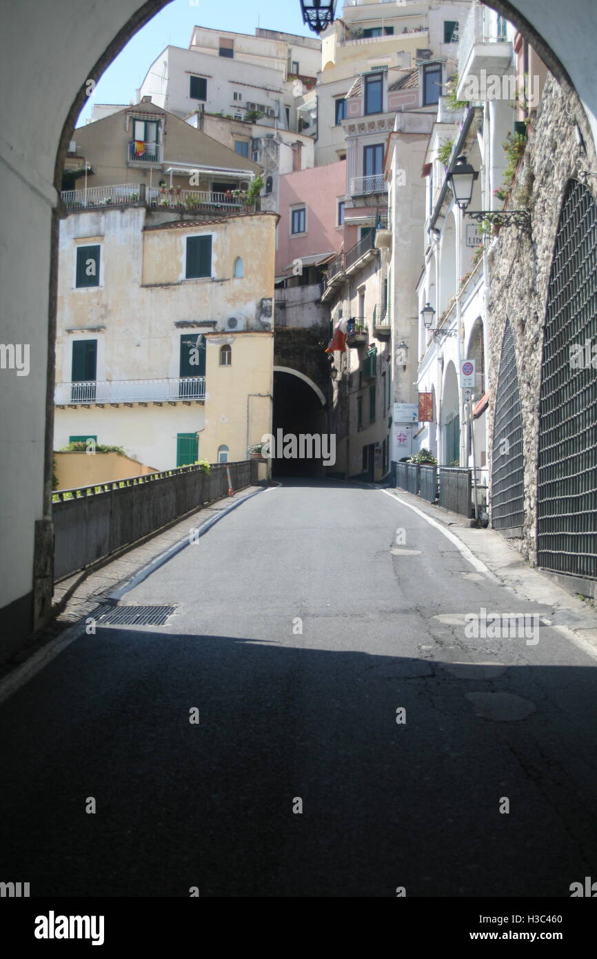 A small narrow street, in the Amalfi Coast area of Naples, Italy, taken ...