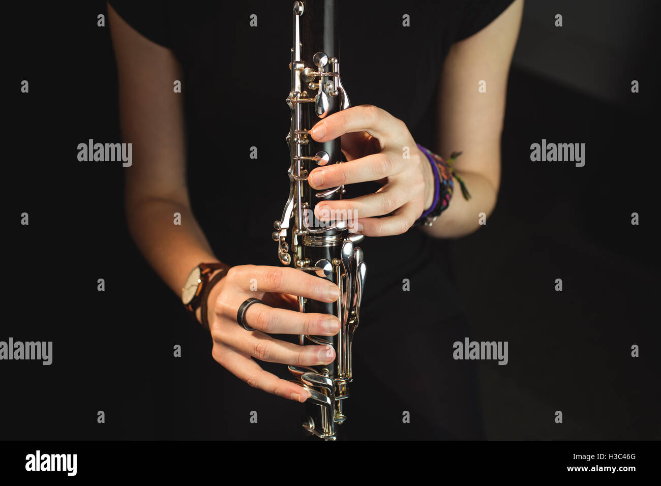 Woman playing a clarinet in music school Stock Photo - Alamy
