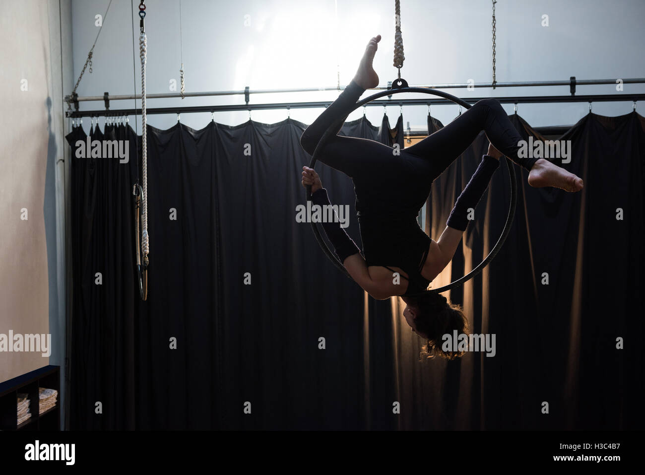 Gymnast performing gymnastics on hoop Stock Photo - Alamy