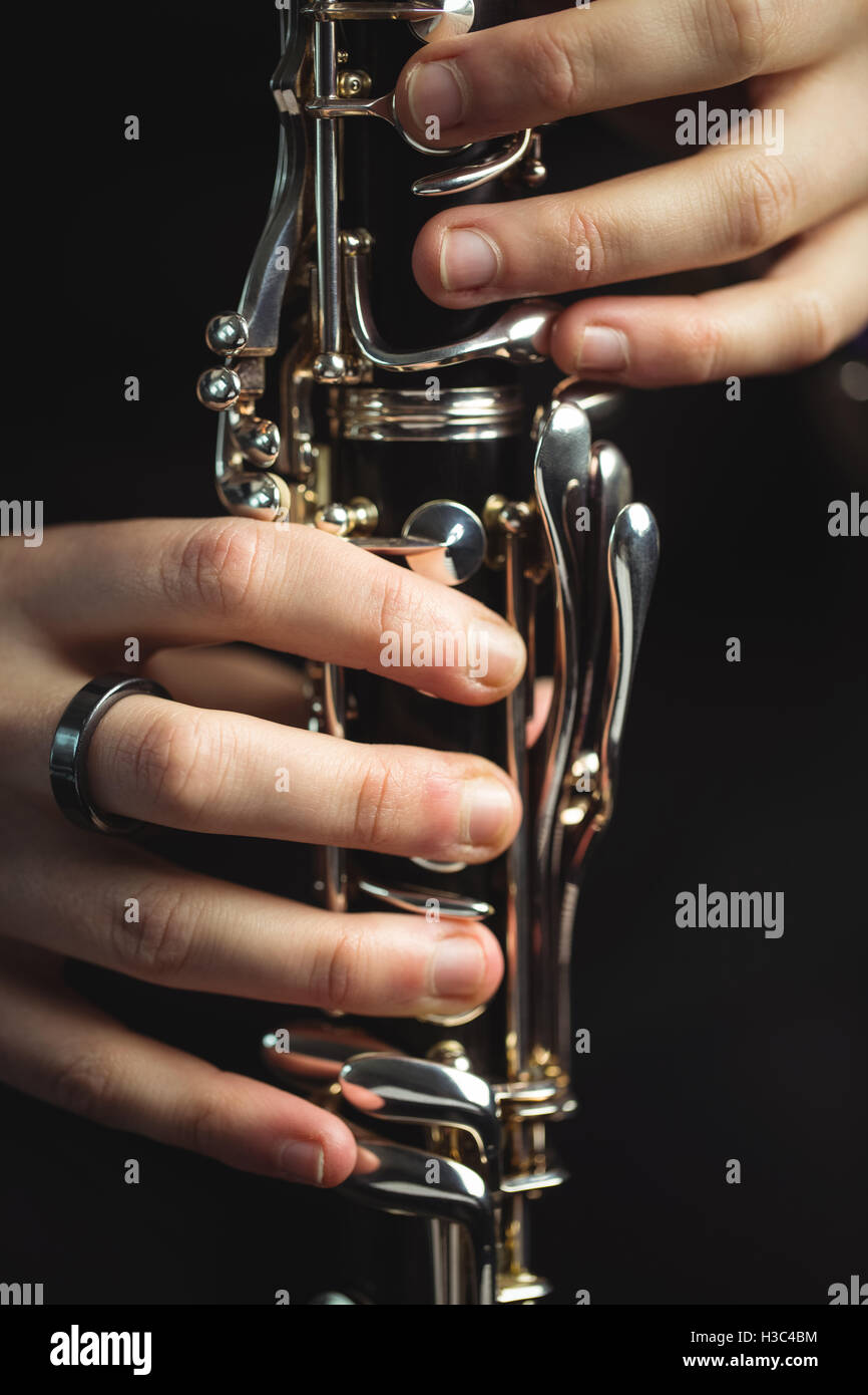 Woman playing a clarinet in music school Stock Photo - Alamy