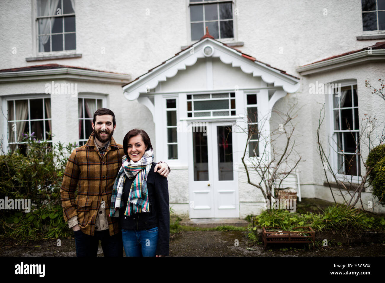 Standing near house hi-res stock photography and images - Alamy