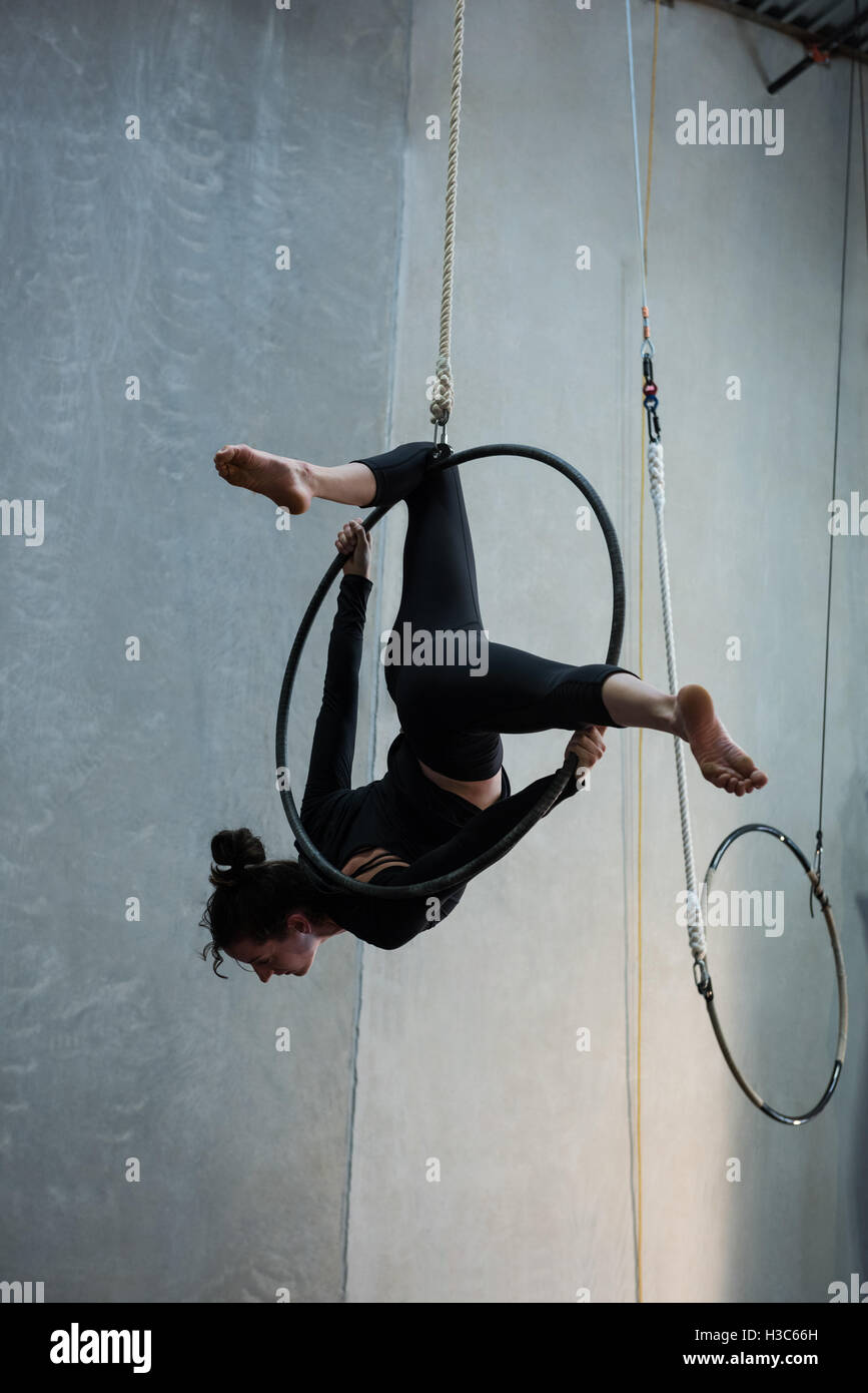 Gymnast performing gymnastics on hoop Stock Photo - Alamy