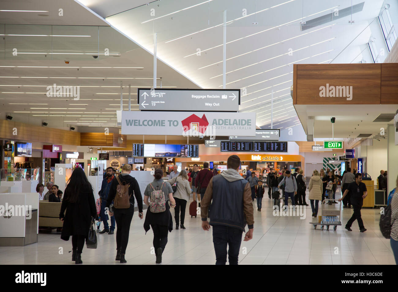 Adelaide airport domestic airport terminal interior, passengers walking ...