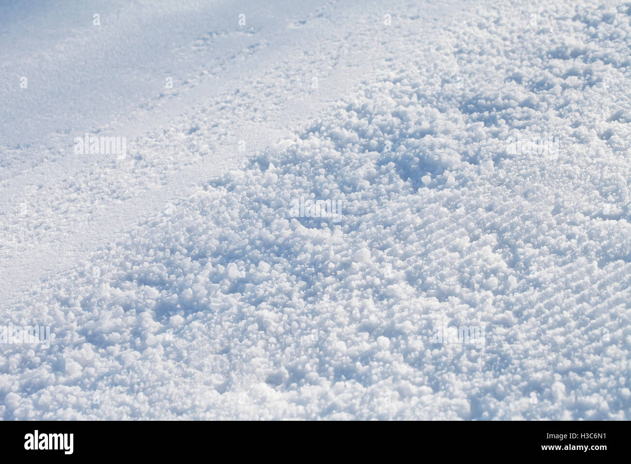 Snow texture, winter background, snow grains closeup Stock Photo - Alamy