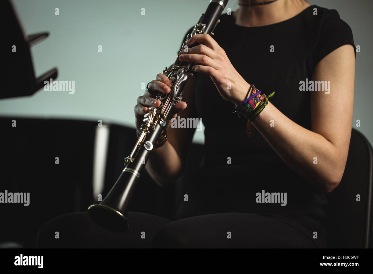 Woman playing a clarinet in music school Stock Photo - Alamy
