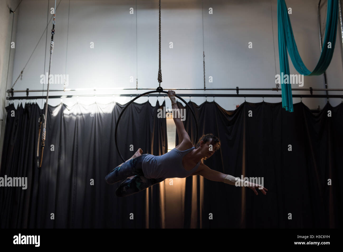 Gymnast performing gymnastics on hoop Stock Photo - Alamy