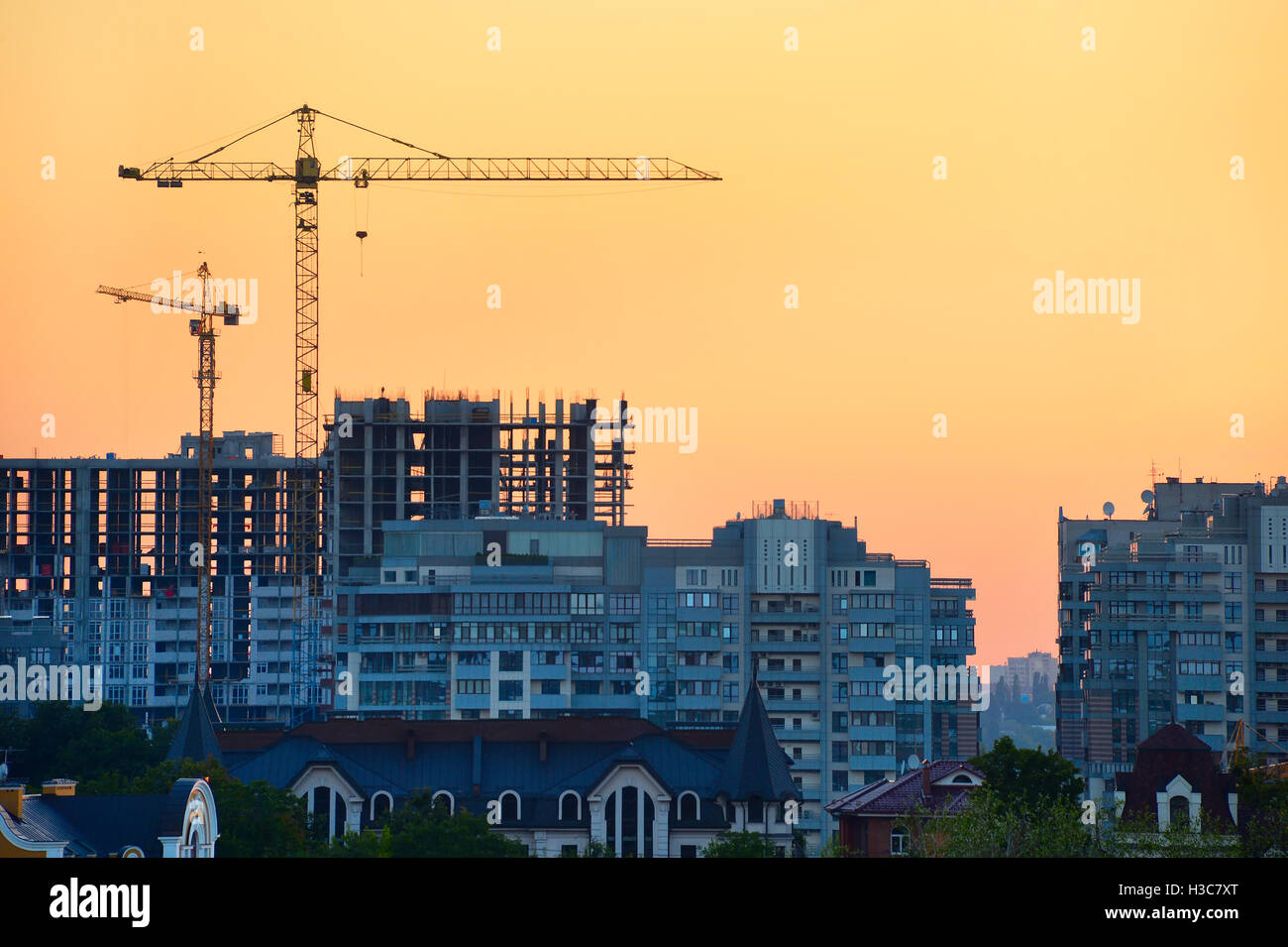 View of Construction site in the colorful sunset Stock Photo - Alamy