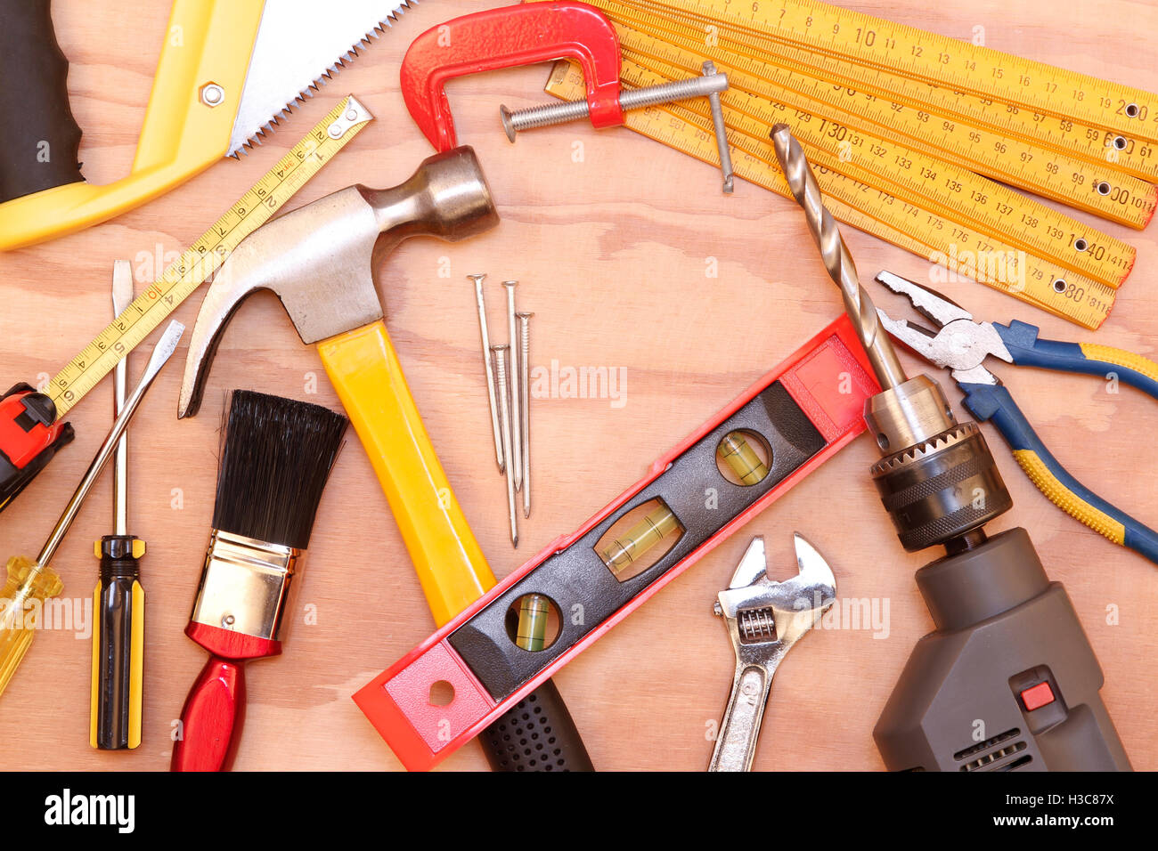 Assorted work tools on wood Stock Photo - Alamy