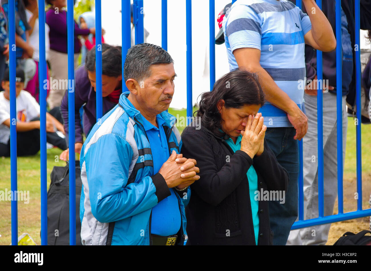 Praying sitting head down hi-res stock photography and images - Alamy